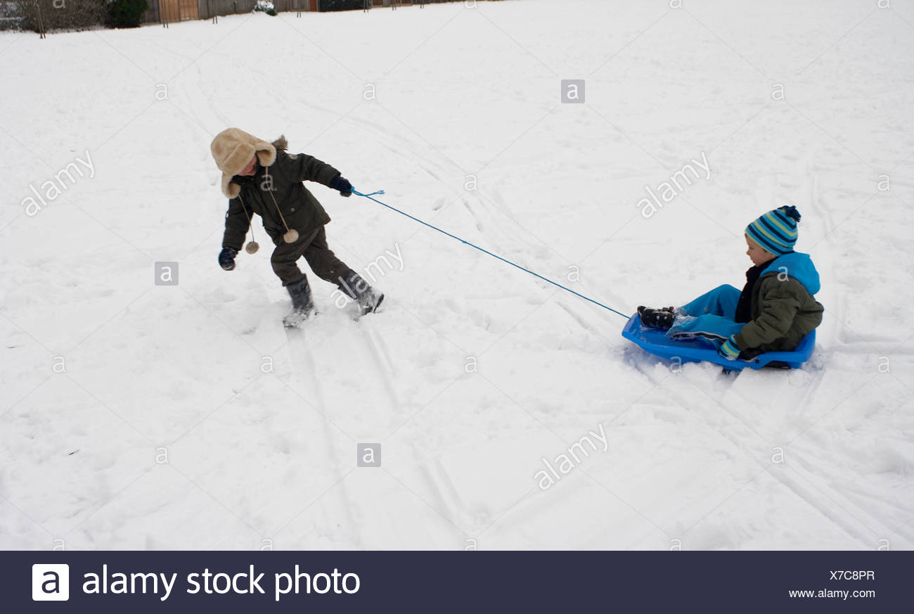 Kid Sled High Resolution Stock Photography and Images - Alamy