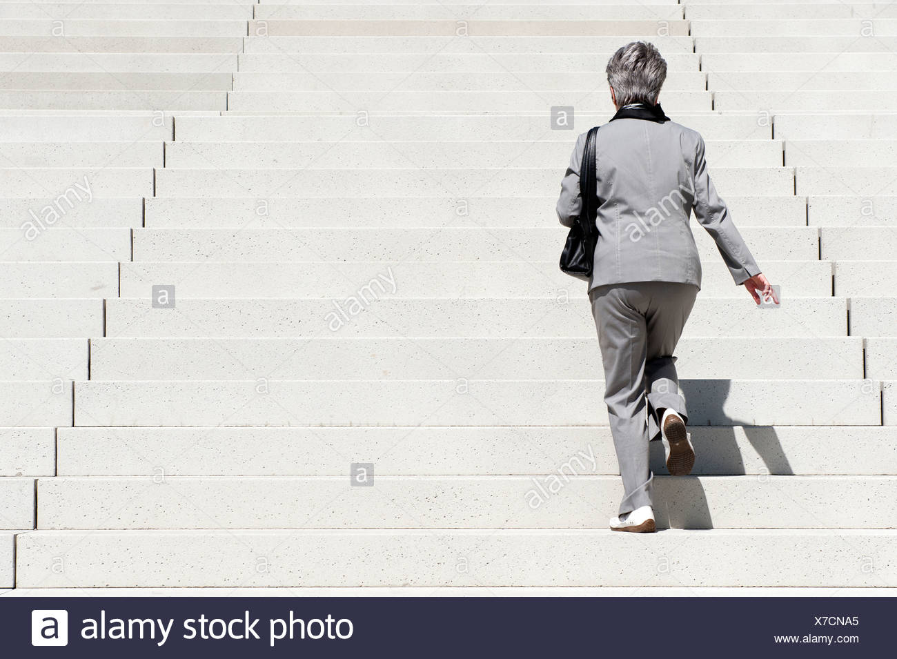 Female Climbing Stairs High Resolution Stock Photography and Images - Alamy