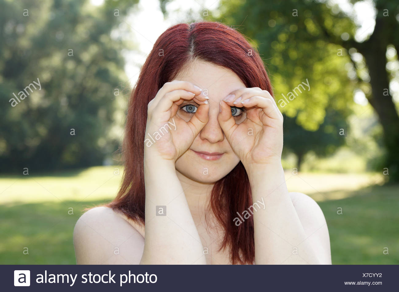 Looking Peering High Resolution Stock Photography and Images - Alamy