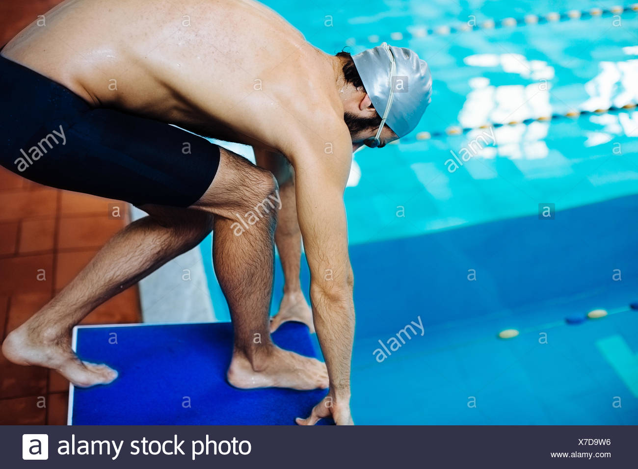 Swimmer On Starting Block Stock Photos & Swimmer On Starting Block ...