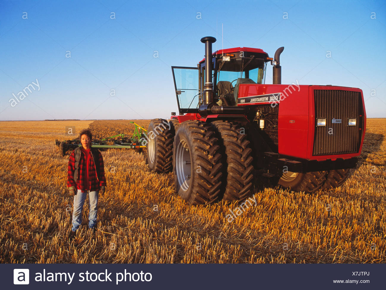 Farmer Posing With Tractor High Resolution Stock Photography and Images ...
