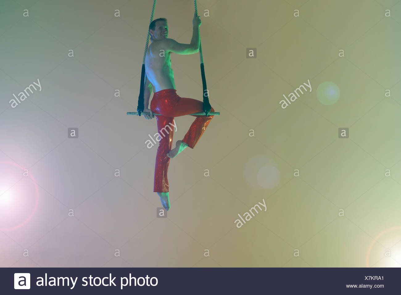 Acrobat On Trapeze High Resolution Stock Photography and Images - Alamy