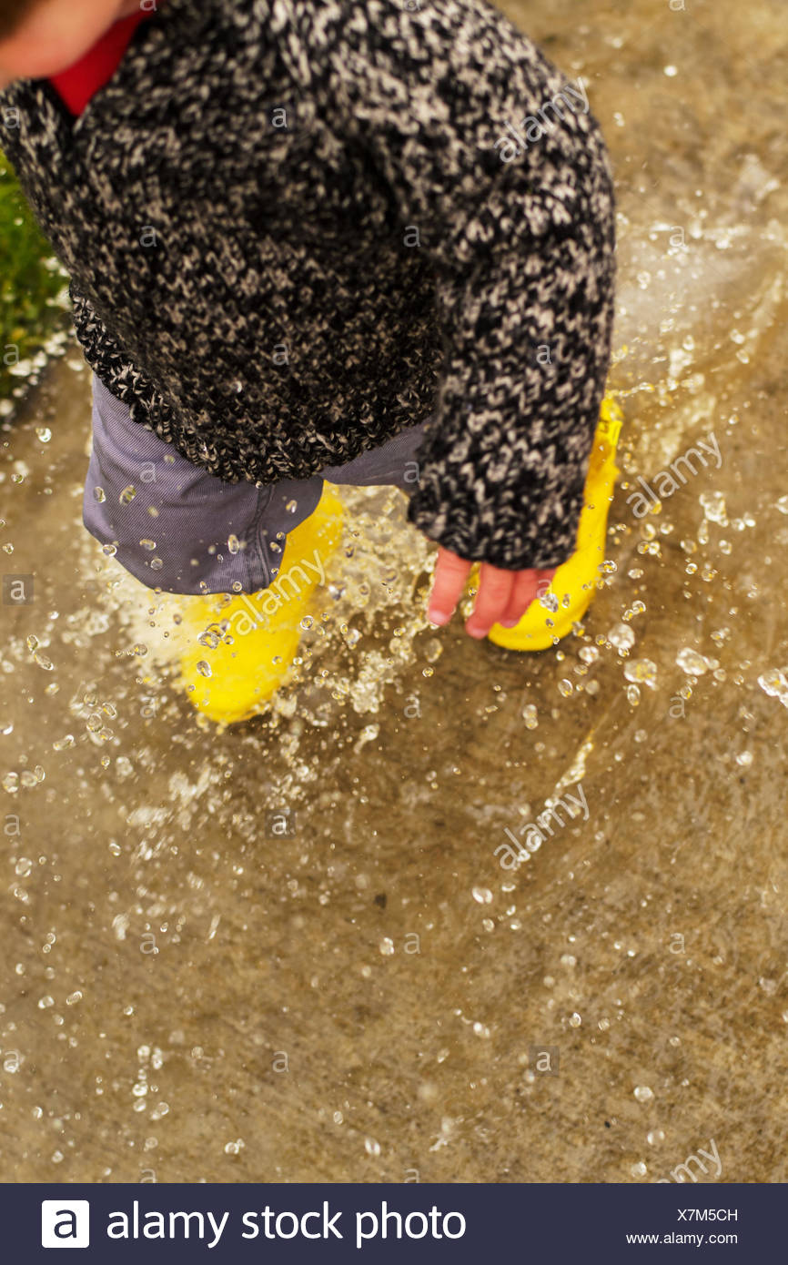 Boy In Puddle High Resolution Stock Photography and Images - Alamy