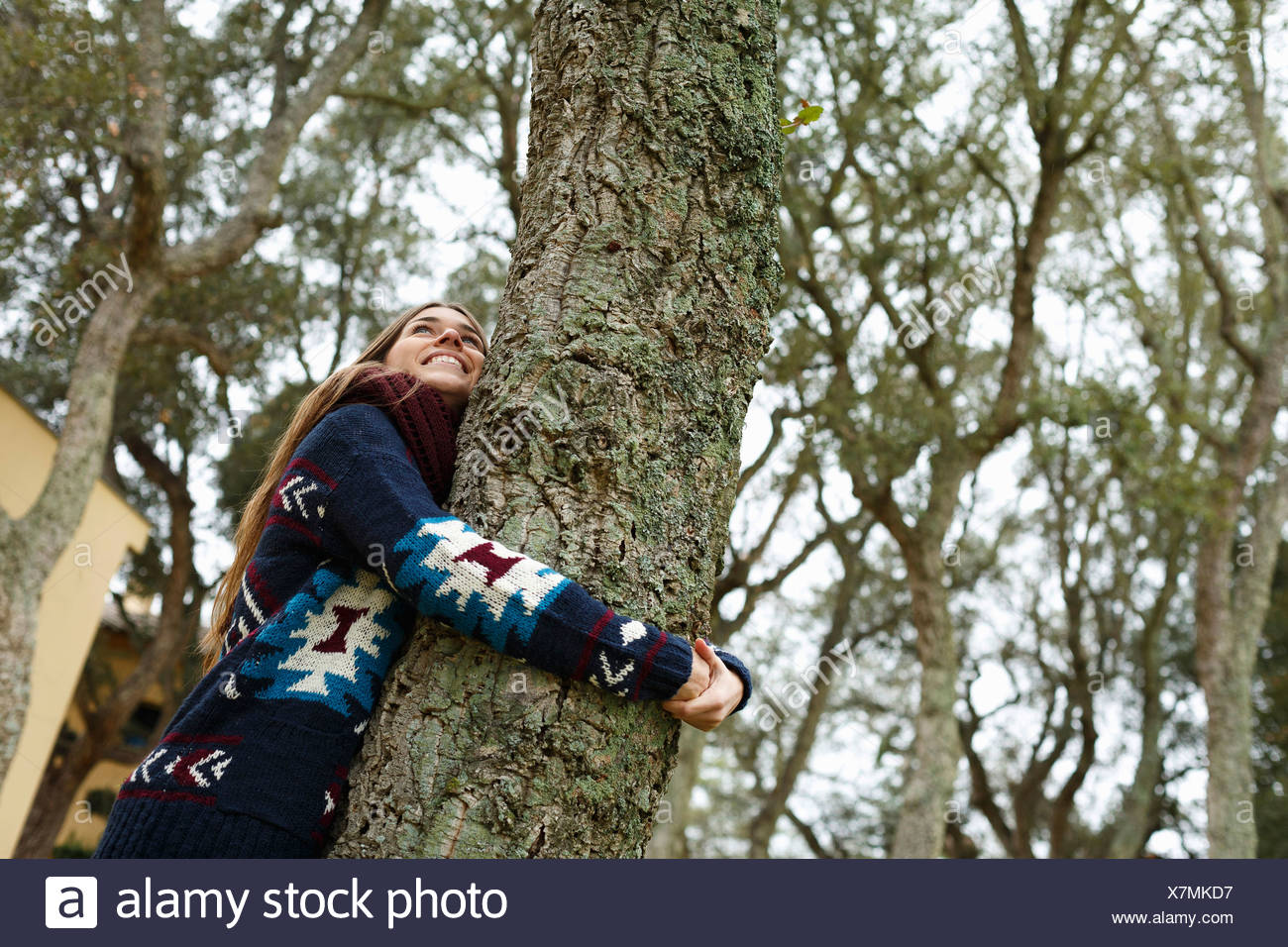 Woman Hugging Tree High Resolution Stock Photography and Images - Alamy