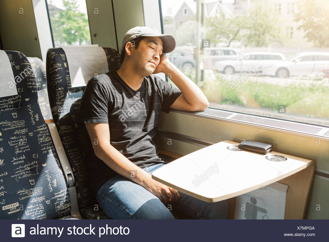Person Sleeping On Train High Resolution Stock Photography and Images ...