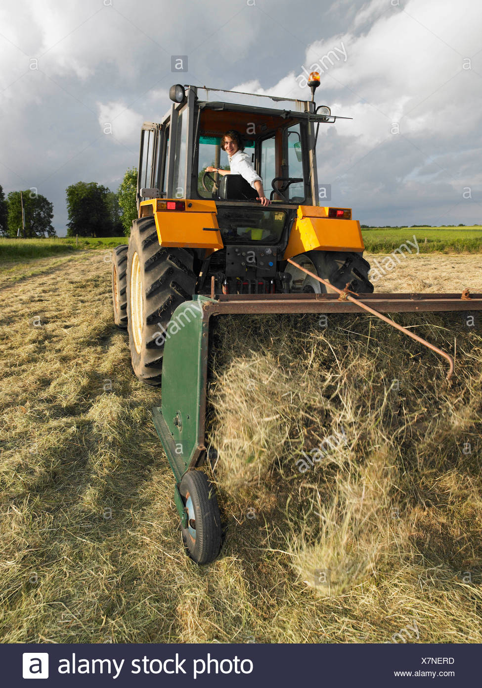 Farmer Driving Tractor High Resolution Stock Photography and Images - Alamy