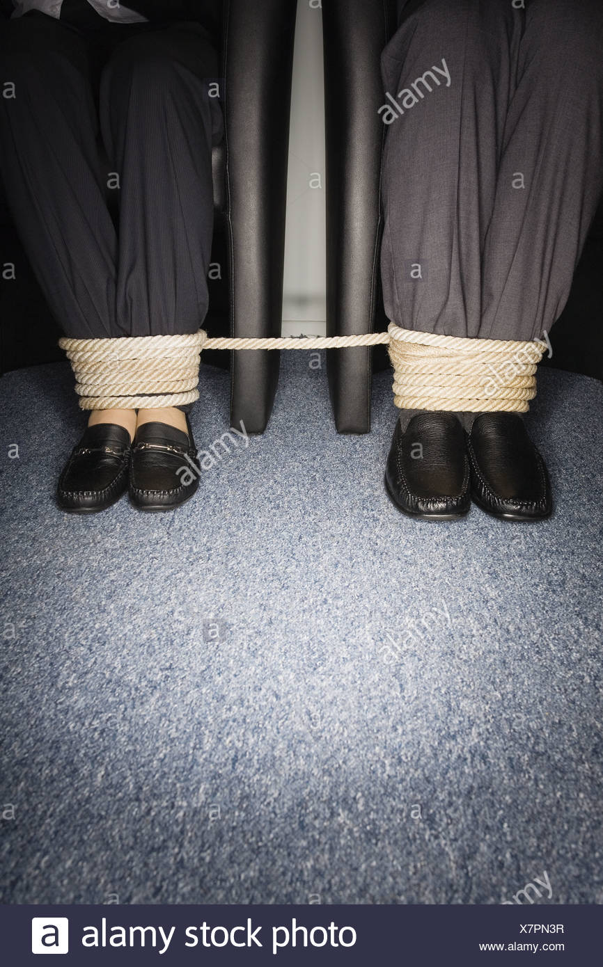 Legs Tied Rope High Resolution Stock Photography and Images - Alamy