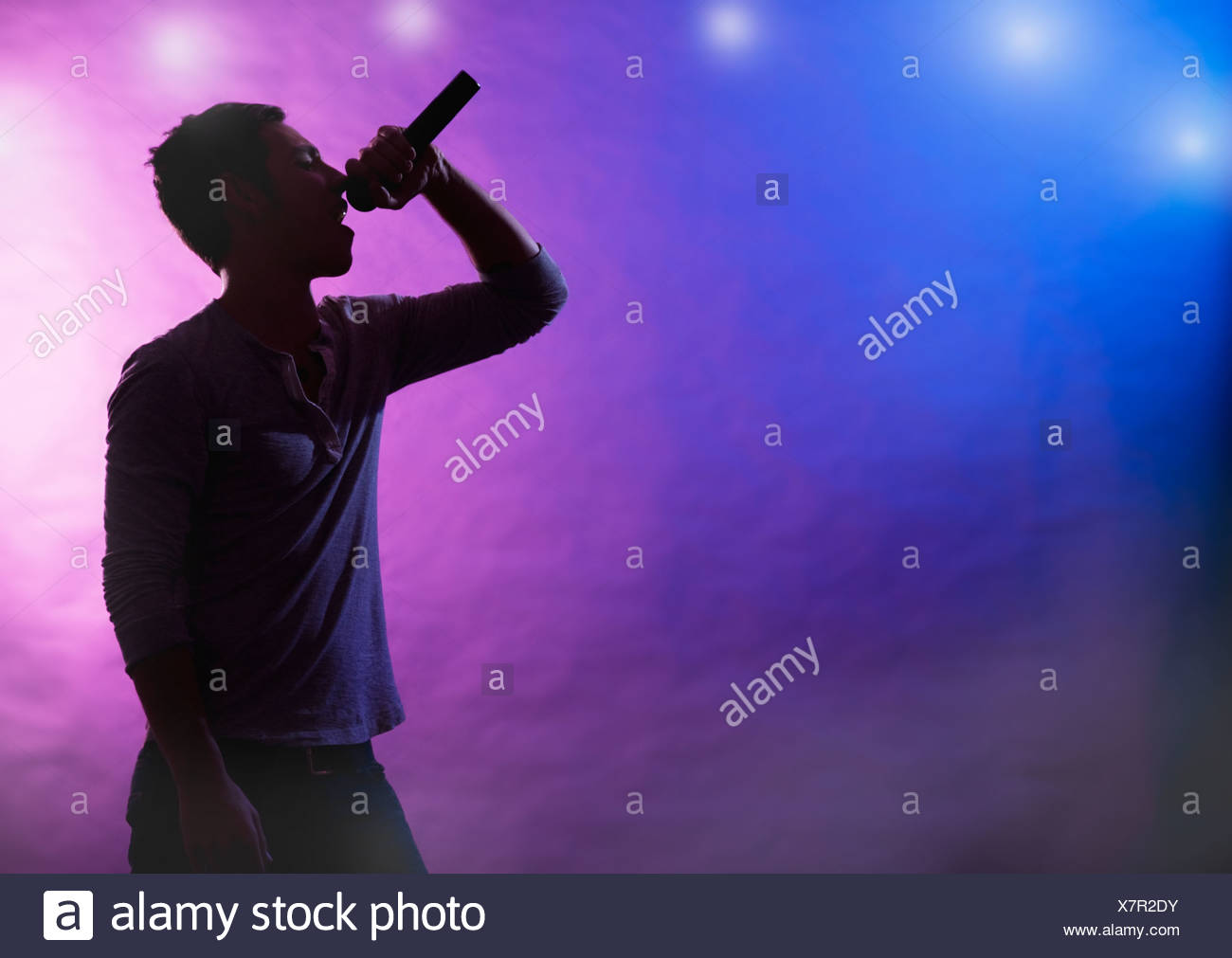 Singer On Stage Silhouette High Resolution Stock Photography and Images ...