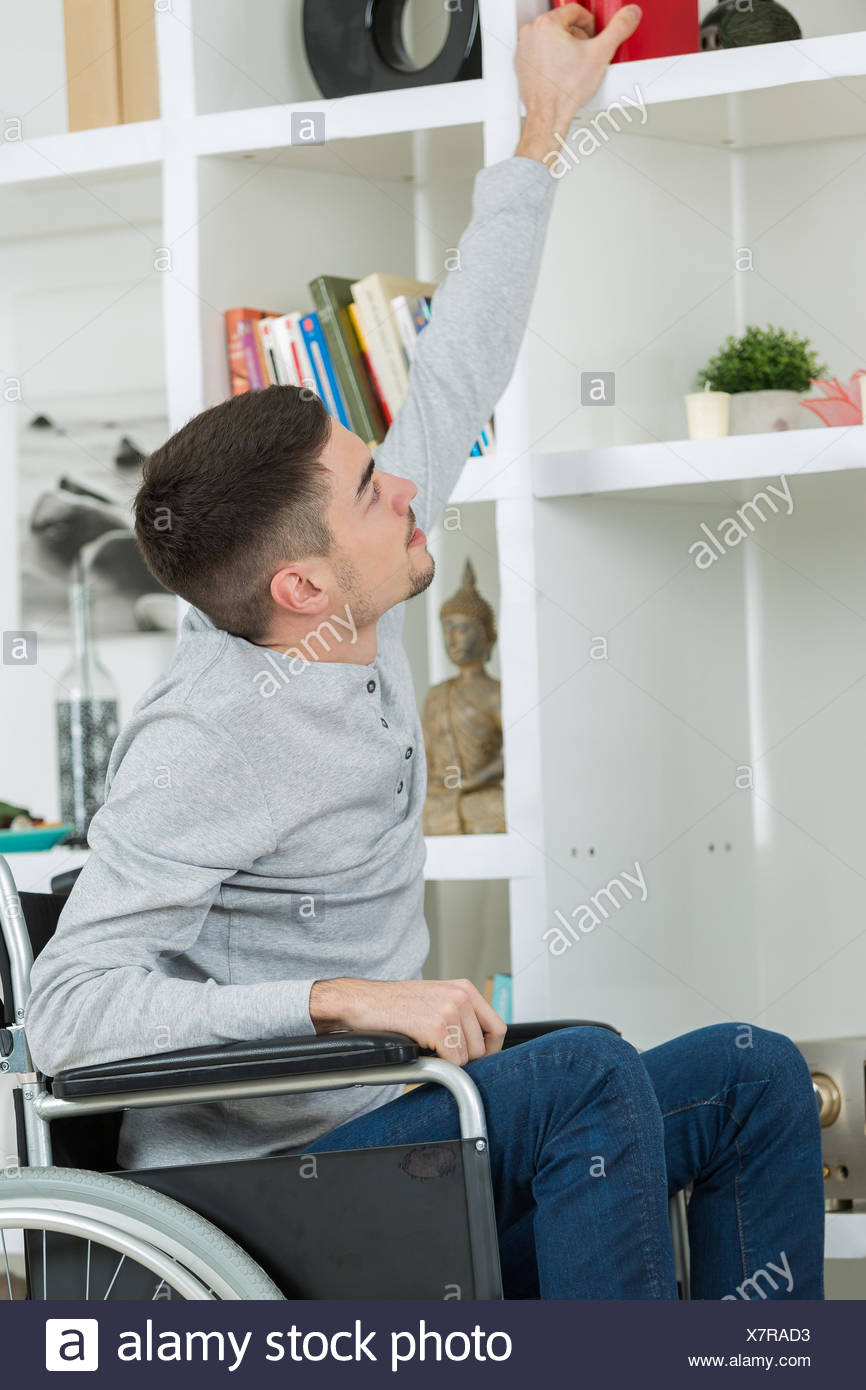 Reaching High Shelf High Resolution Stock Photography and Images - Alamy