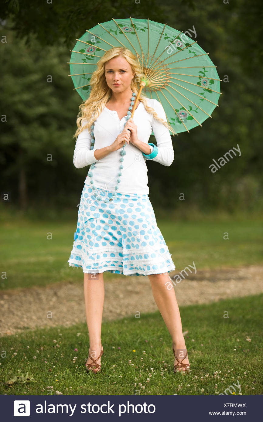 Woman With Parasol High Resolution Stock Photography and Images - Alamy