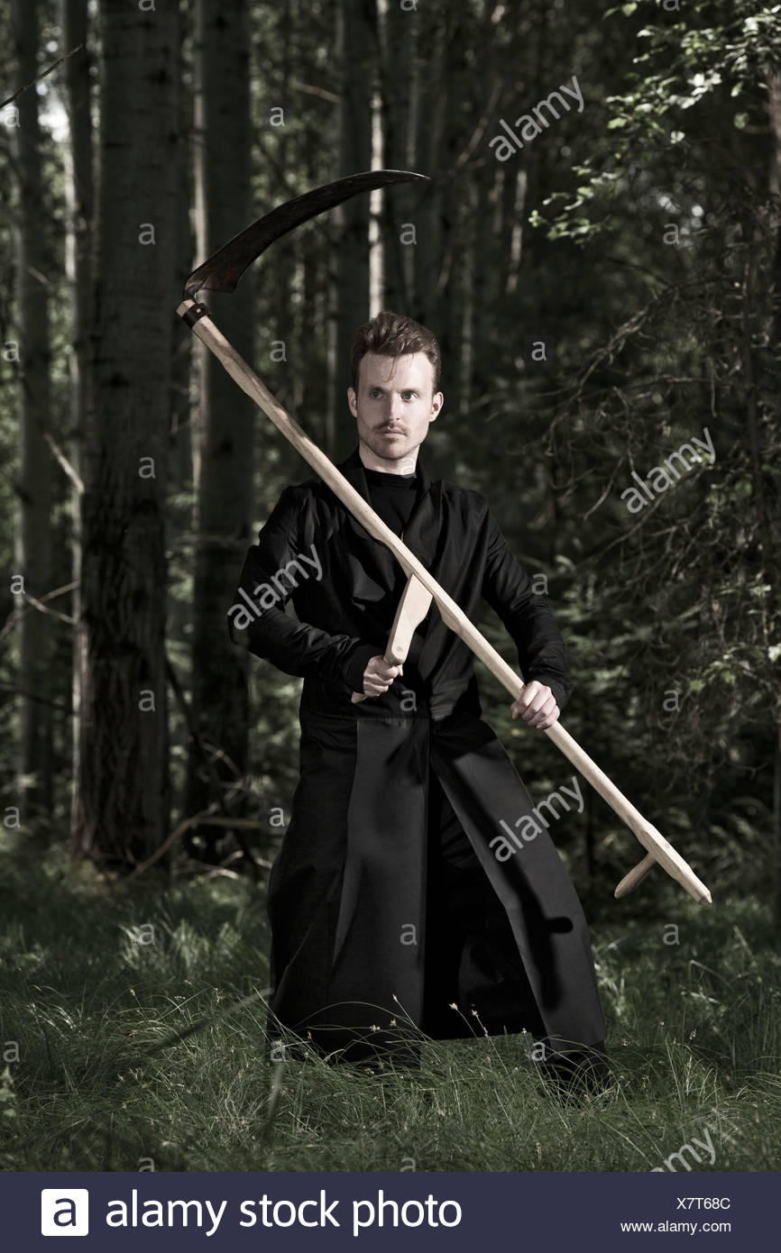 Man With Scythe High Resolution Stock Photography and Images - Alamy