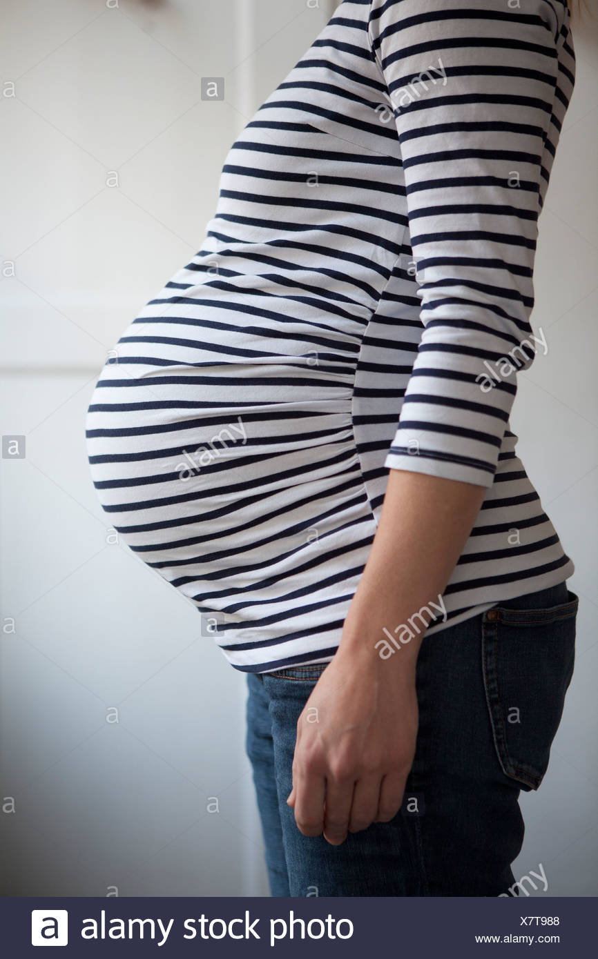 Adults Pregnant Belly High Resolution Stock Photography and Images - Alamy