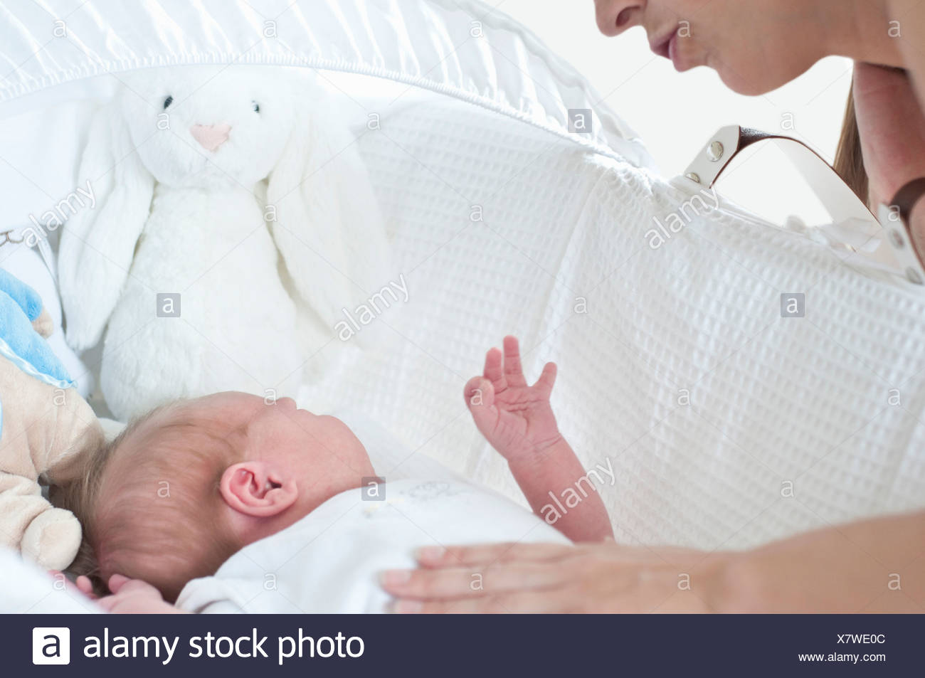 Baby In Cradle High Resolution Stock Photography and Images - Alamy
