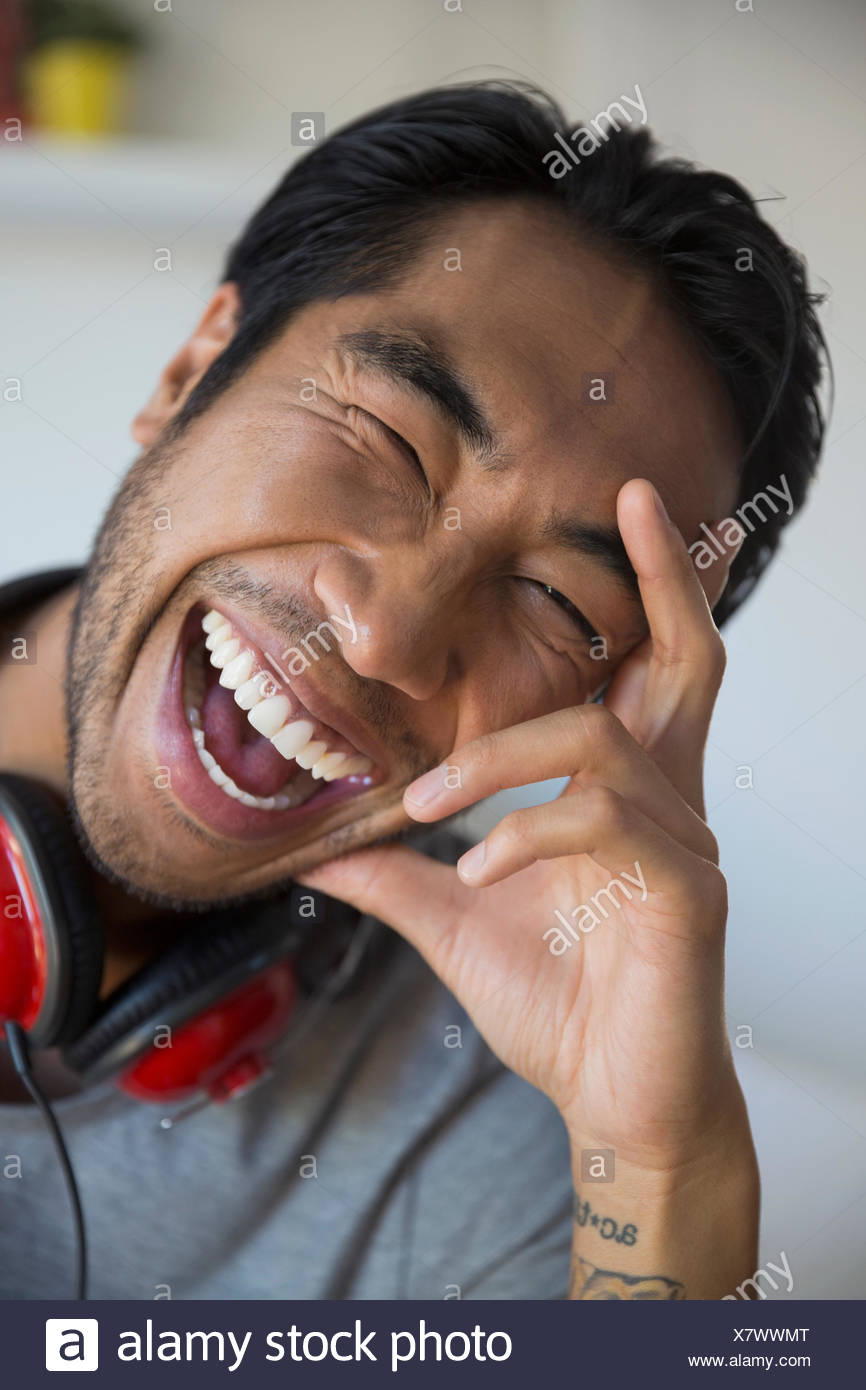 Laughing Man Headphones Stock Photos & Laughing Man Headphones Stock ...