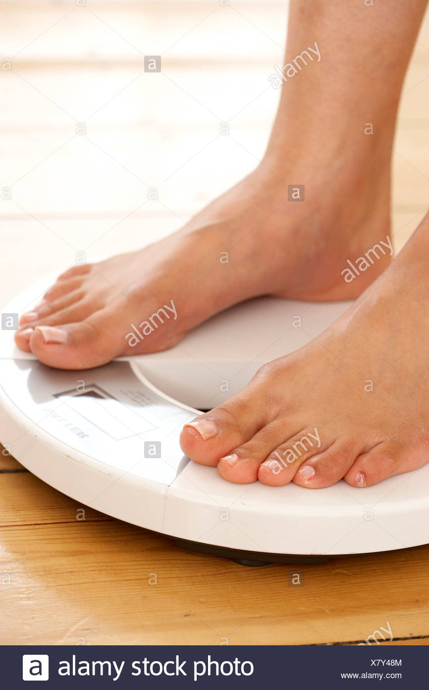 Weight Scales Feet High Resolution Stock Photography and Images - Alamy