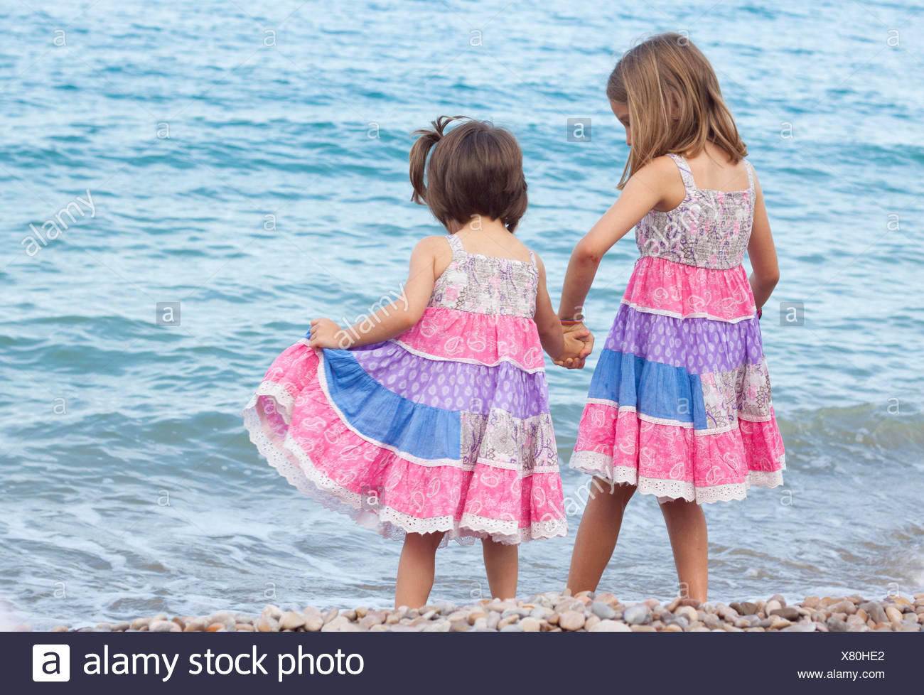 Sisters Holding Hands High Resolution Stock Photography and Images - Alamy