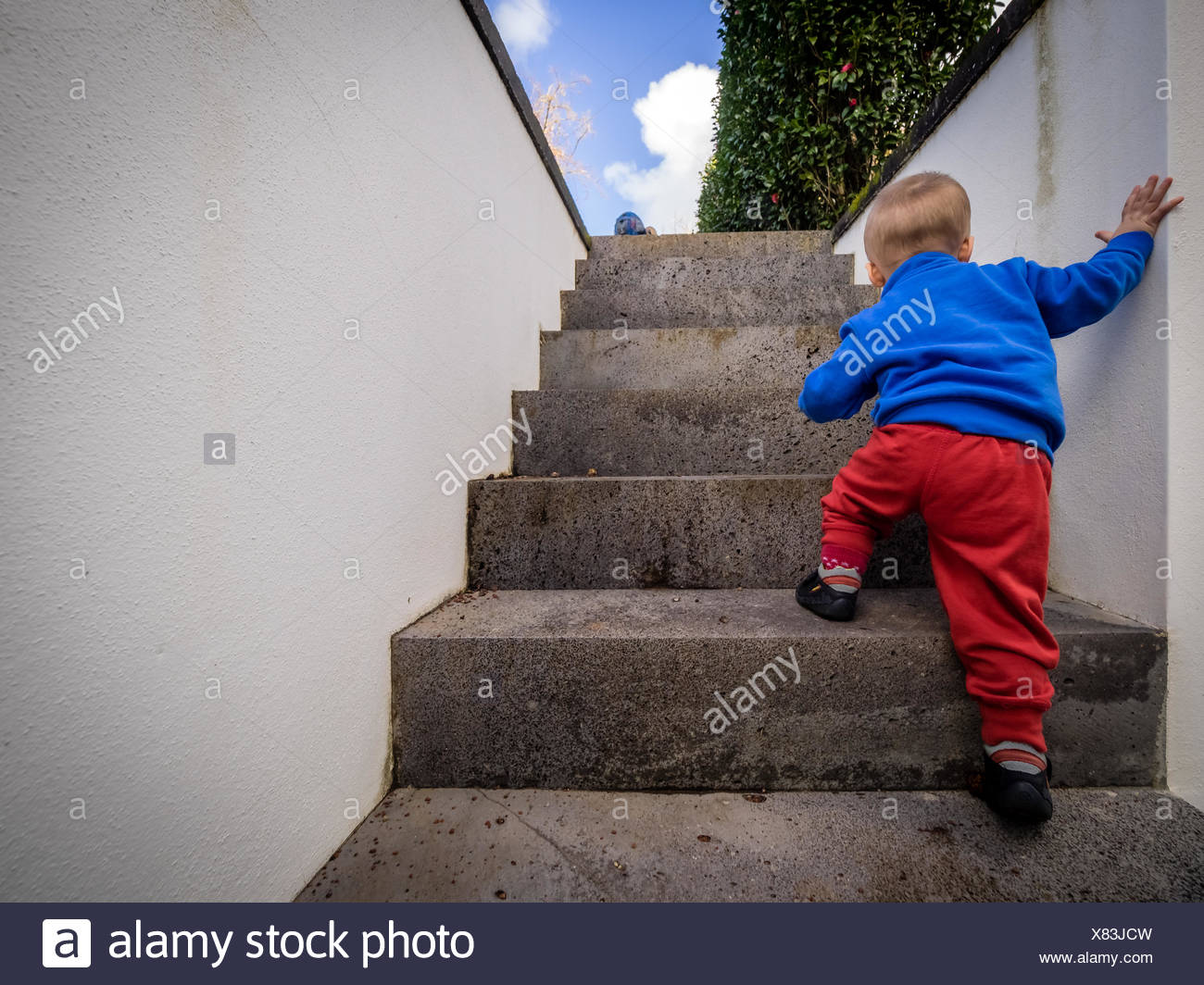 Toddler Climbing Steps High Resolution Stock Photography and Images - Alamy