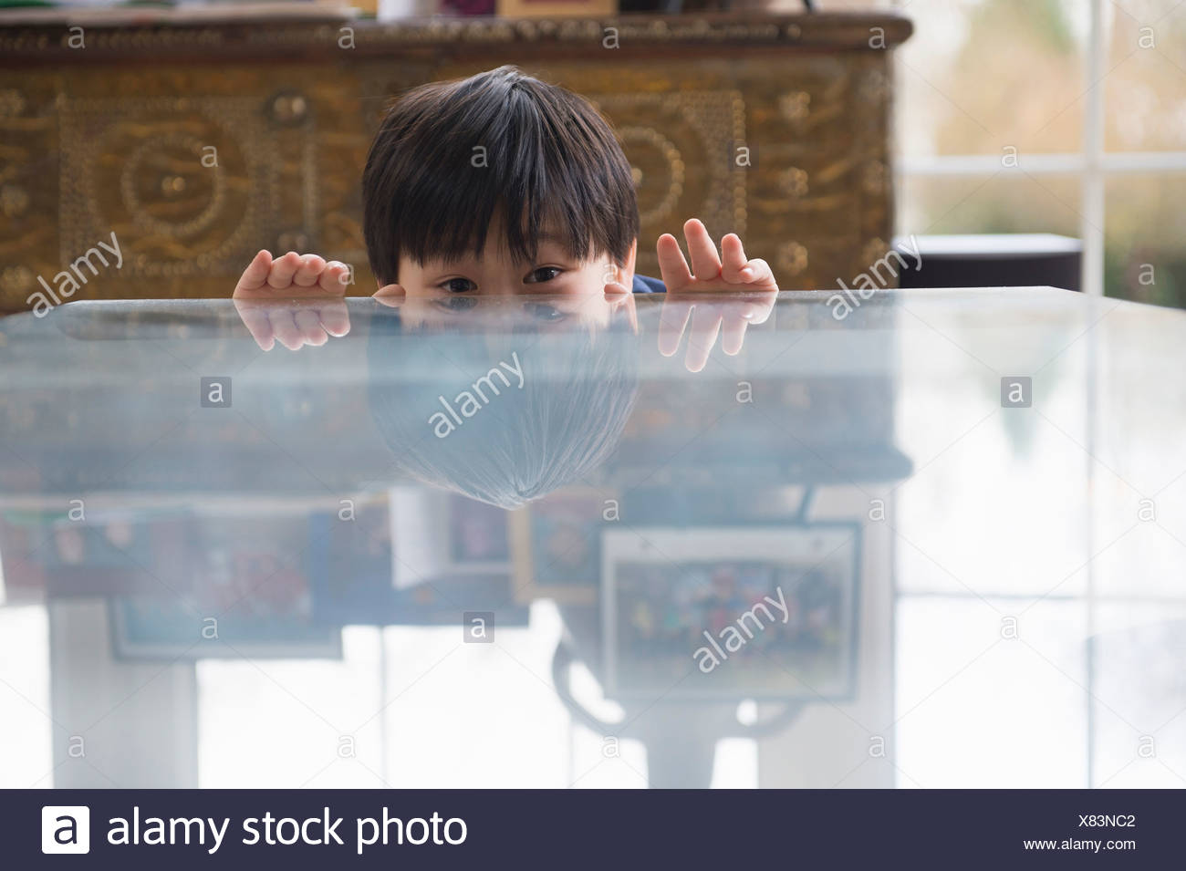 Child Peeking High Resolution Stock Photography and Images - Alamy