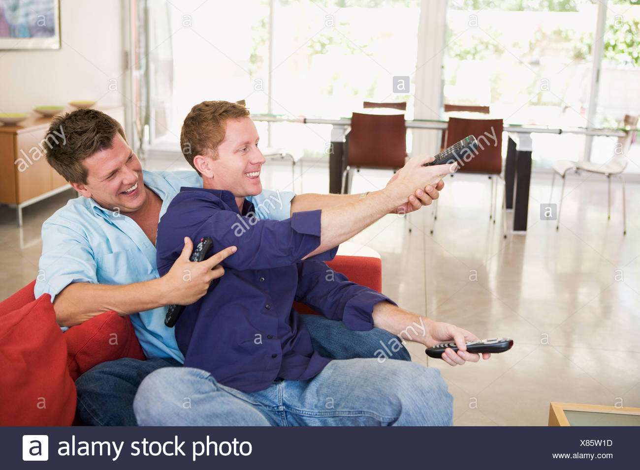 Fighting Over The Remote Control High Resolution Stock Photography and ...