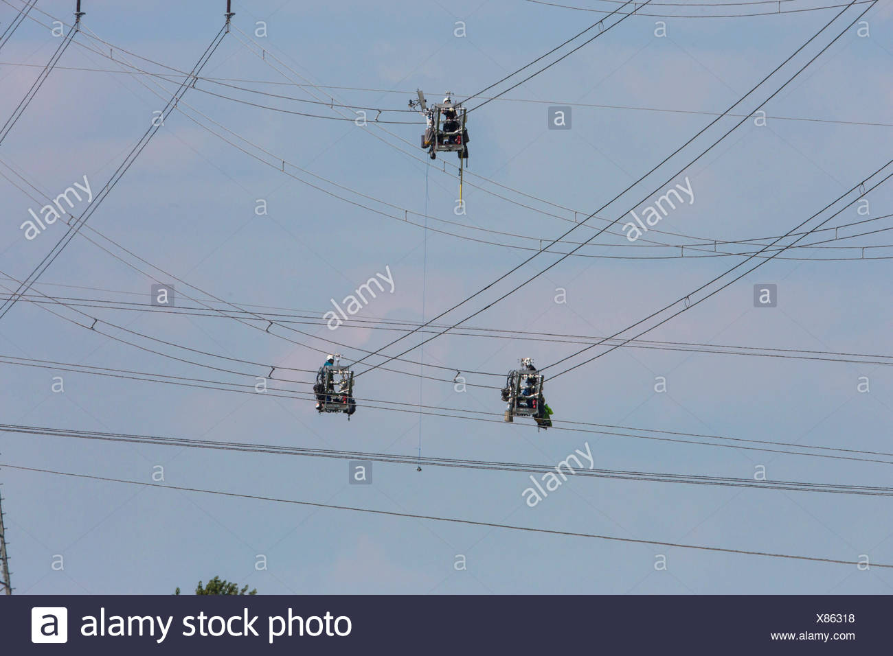 High Voltage Power Lines Maintenance High Resolution Stock Photography ...