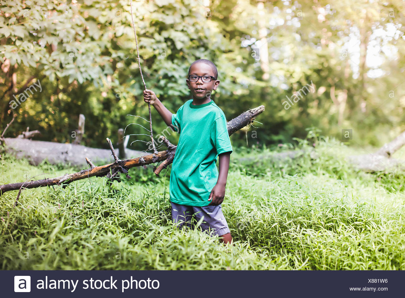 Boy Touching Tree High Resolution Stock Photography and Images - Alamy