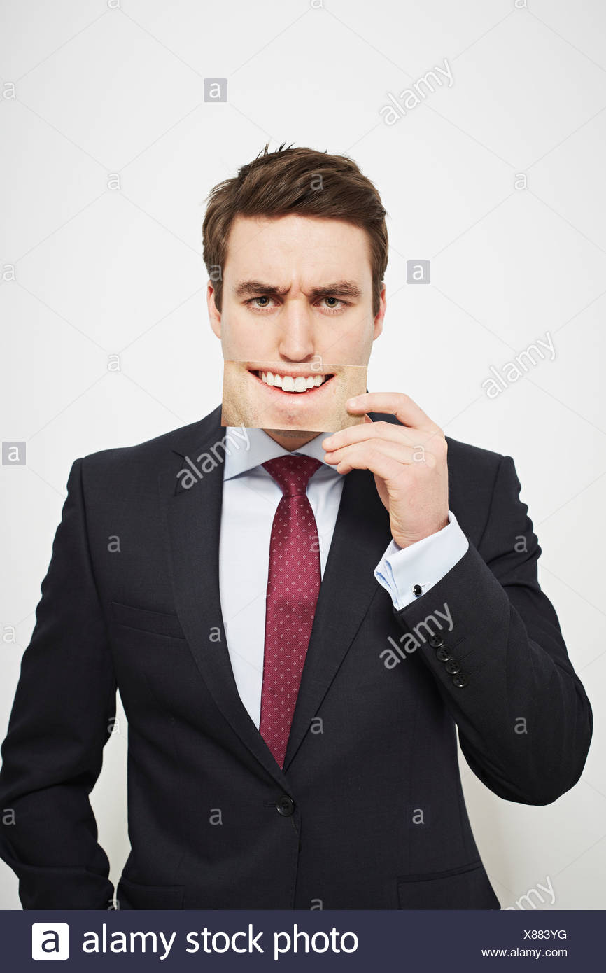 Holding Face High Resolution Stock Photography and Images - Alamy