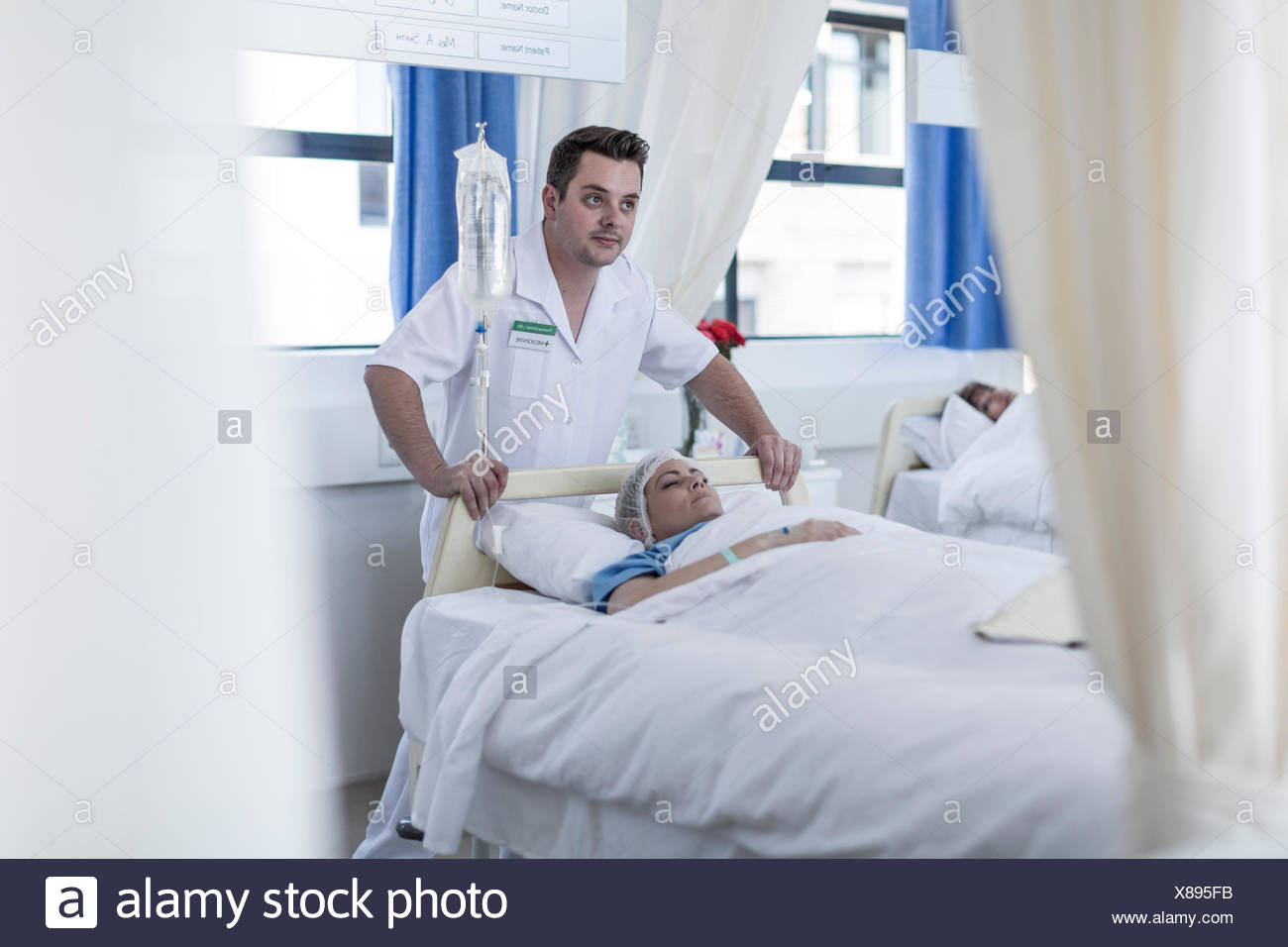 Nurses Moving Hospital Bed High Resolution Stock Photography and Images ...