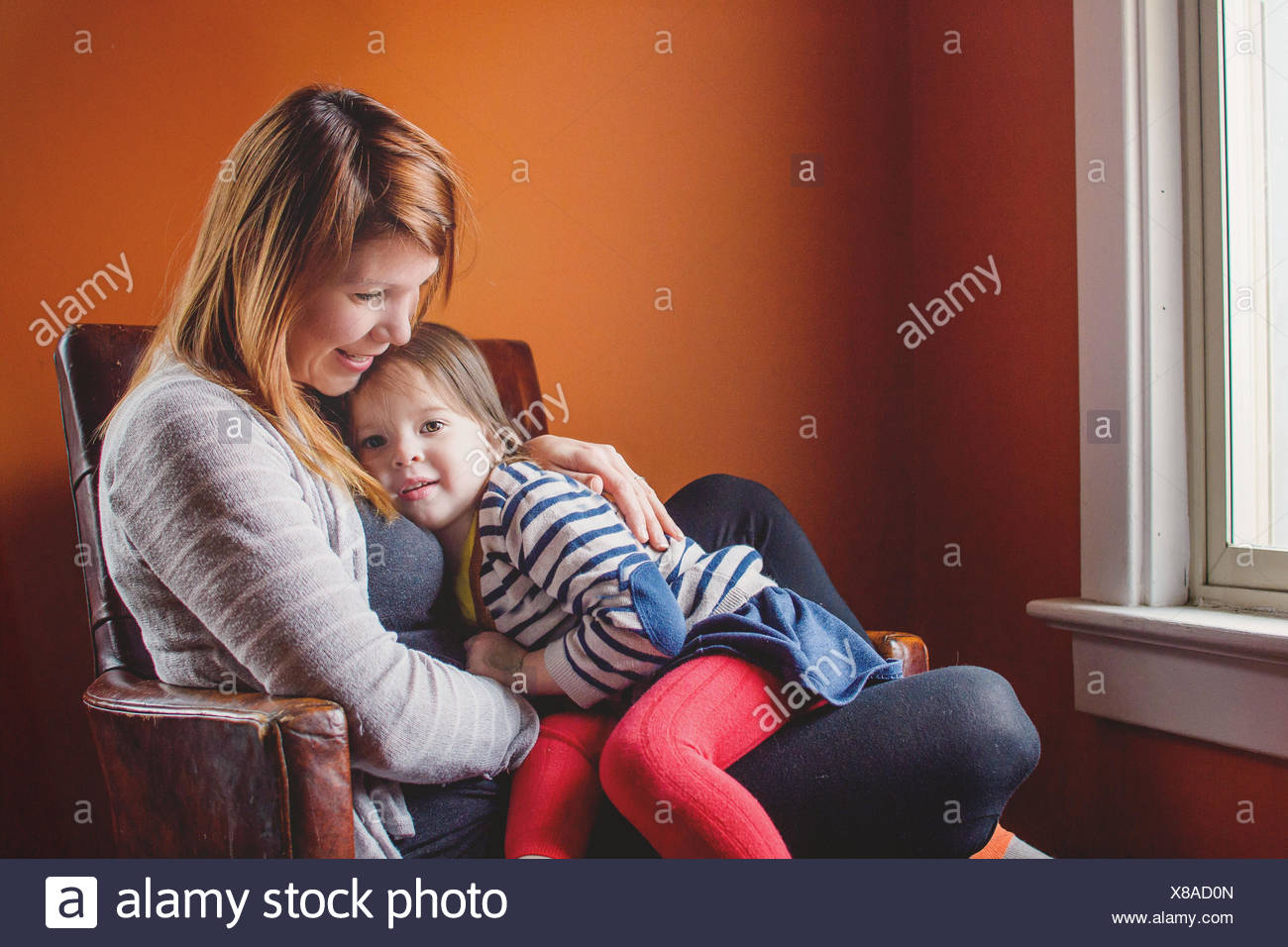 Child Sitting Down Chair Stock Photos & Child Sitting Down Chair Stock ...