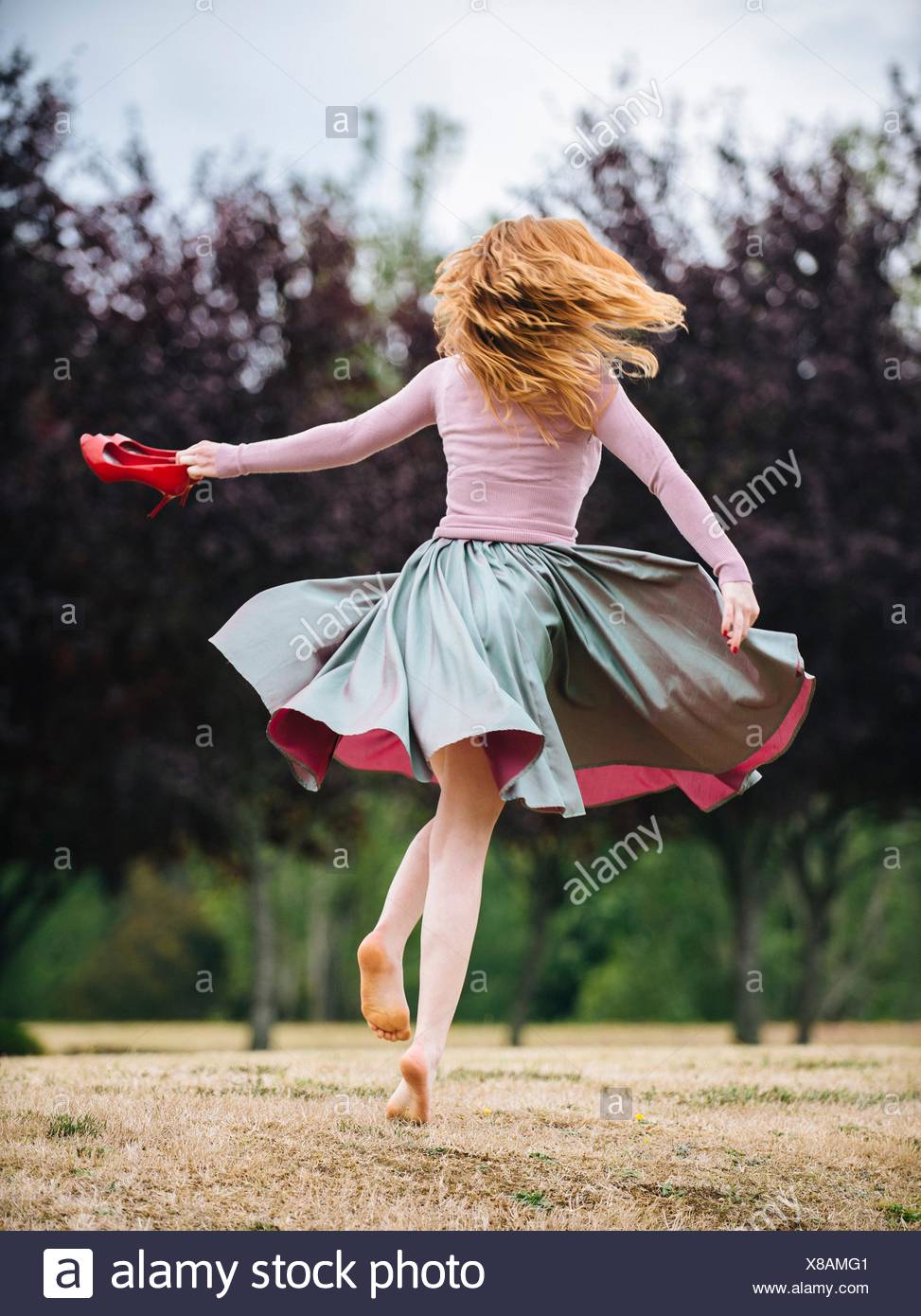 Rear View Young Woman Dancing High Resolution Stock Photography and ...