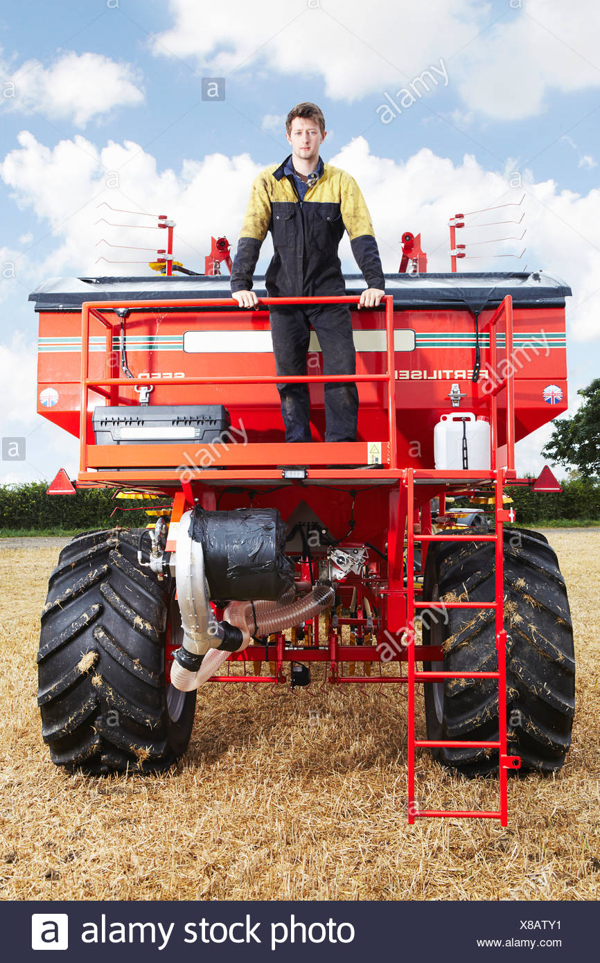 Farmer Posing With Tractor High Resolution Stock Photography and Images ...