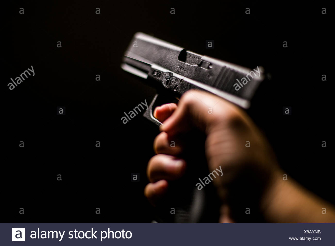 Hand Holding Gun Stock Photos & Hand Holding Gun Stock Images - Alamy