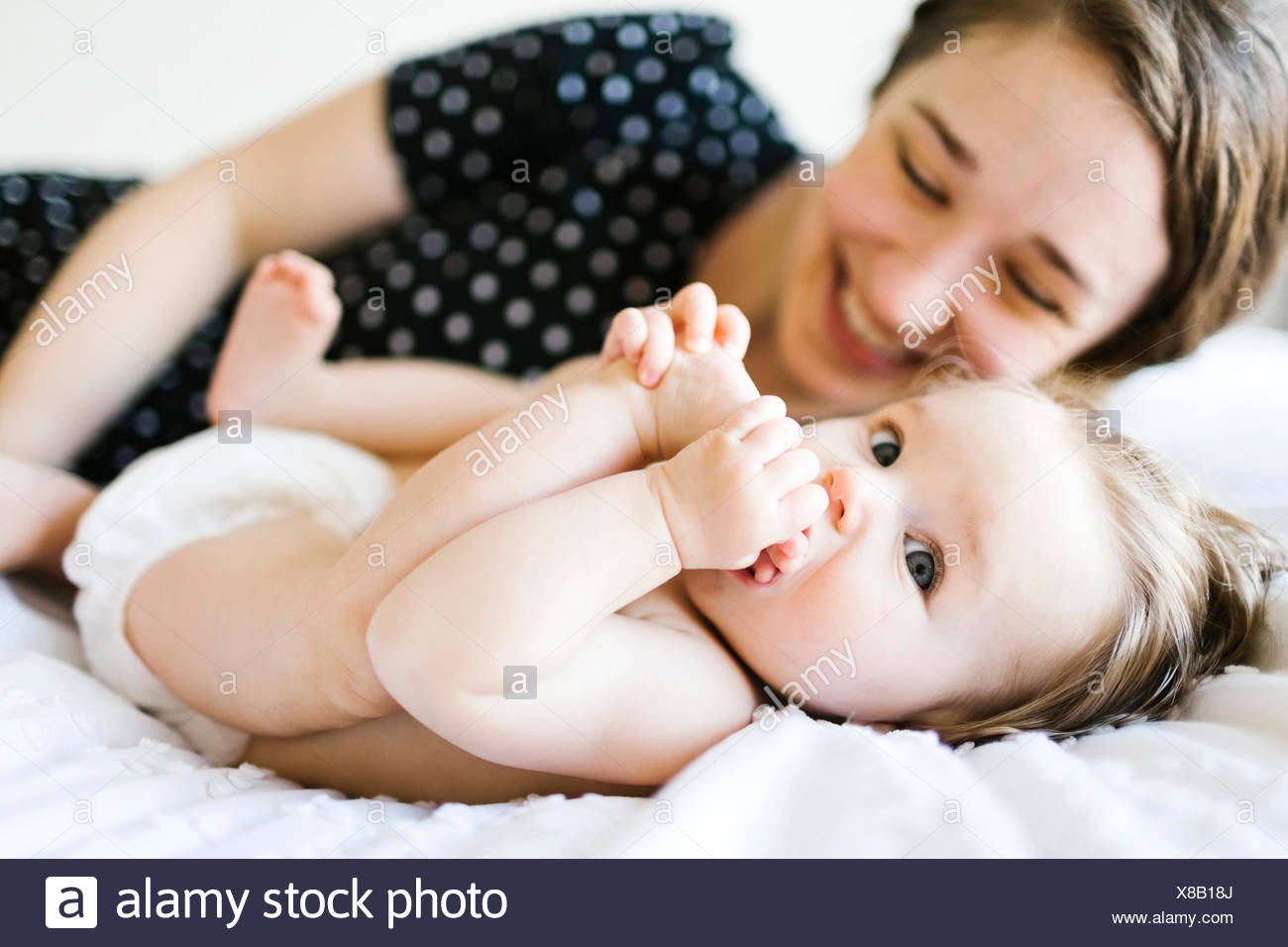 Biting Her Foot Stock Photos & Biting Her Foot Stock Images - Alamy