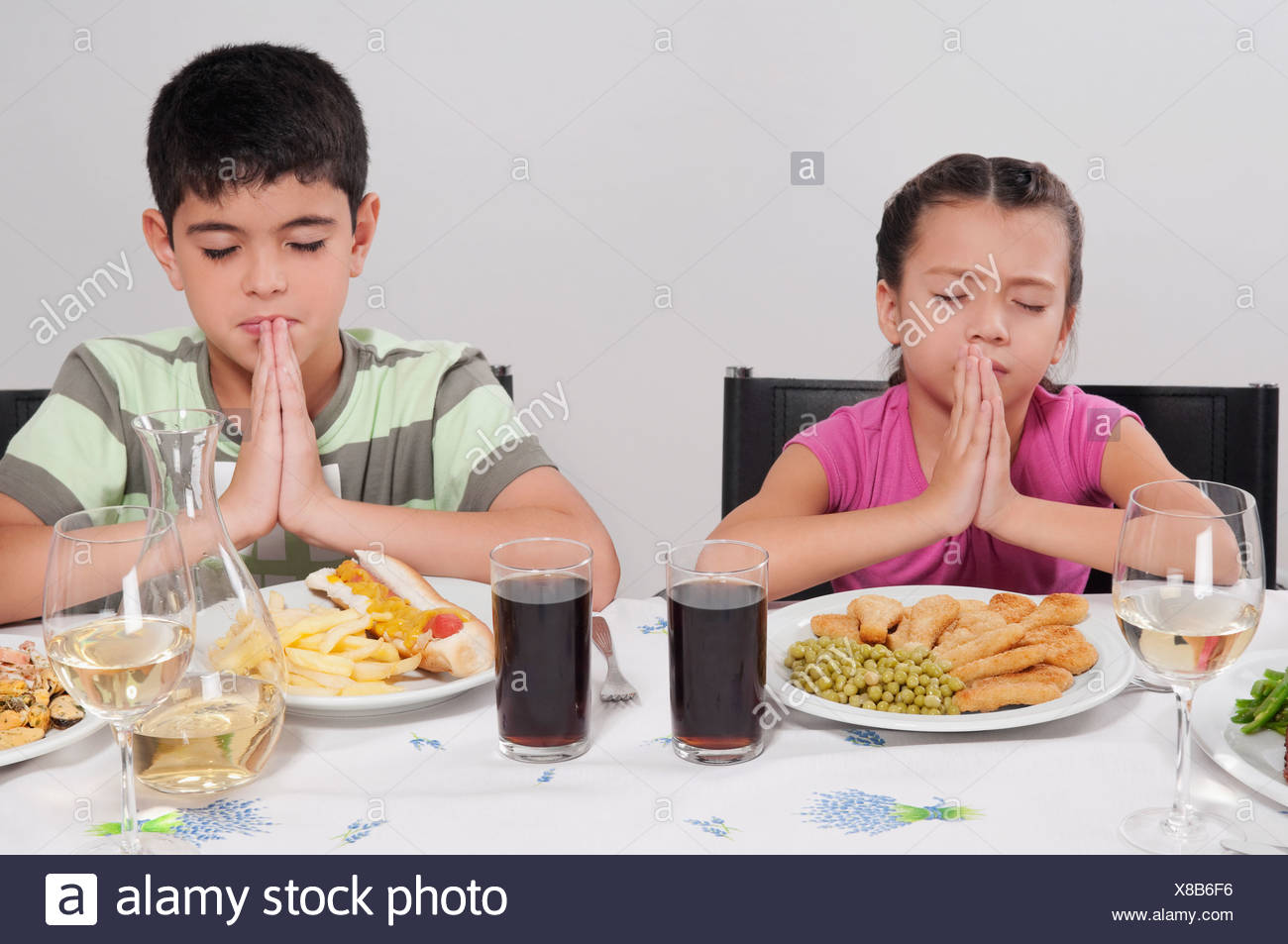 Two Children Praying High Resolution Stock Photography and Images - Alamy