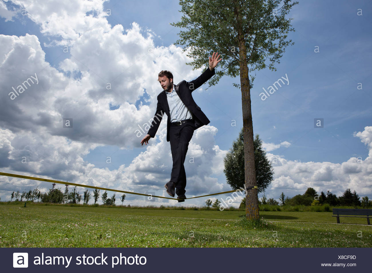 Man Walking Tightrope Stock Photos & Man Walking Tightrope Stock Images ...
