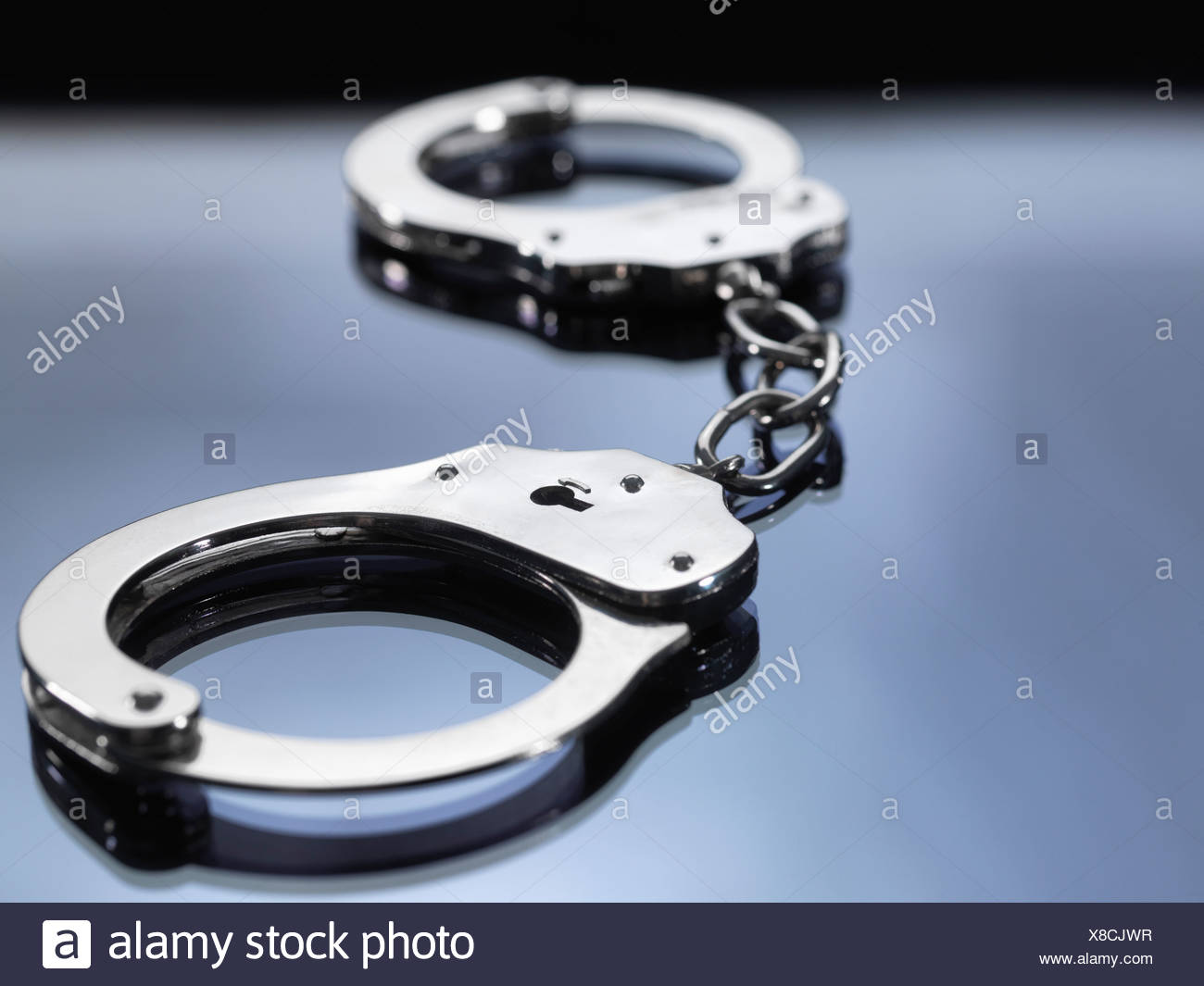 Handcuffs Stock Photos & Handcuffs Stock Images - Alamy