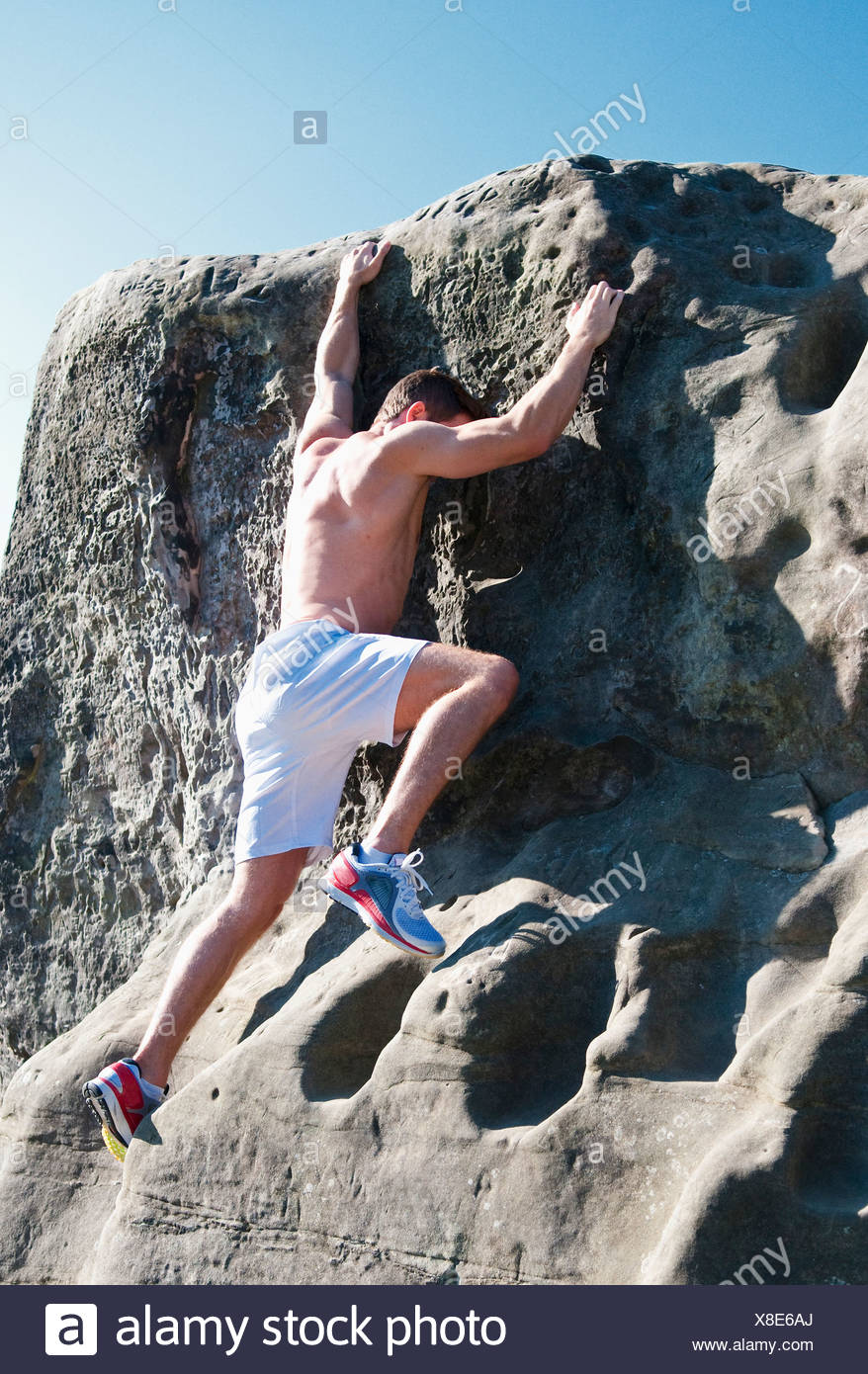Man Climbing Rock Face High Resolution Stock Photography and Images - Alamy