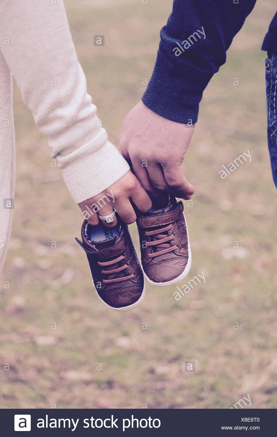 Baby Hand Holding Finger Ring High Resolution Stock Photography and ...