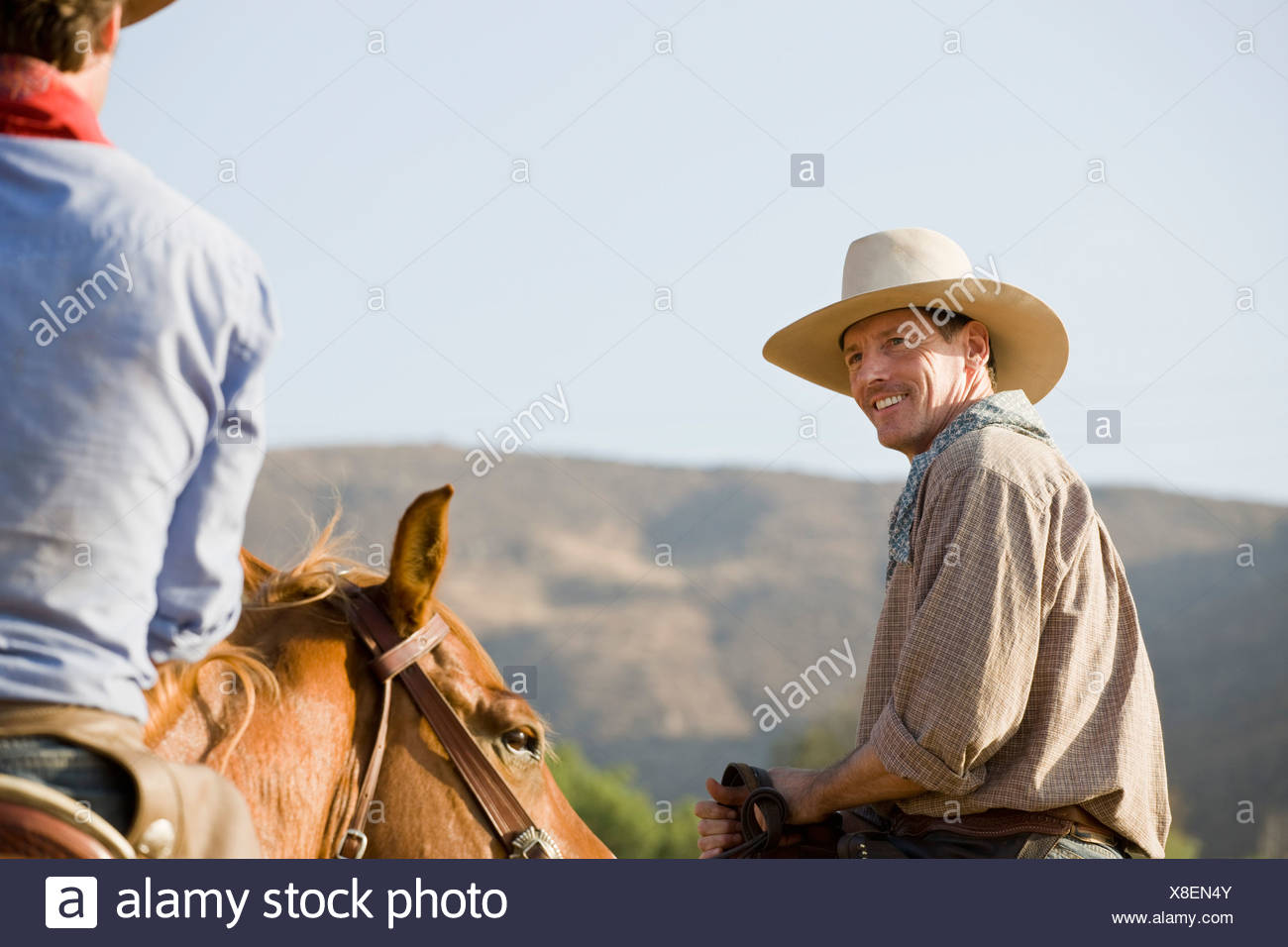 Two Cowboys Riding Horses High Resolution Stock Photography and Images ...