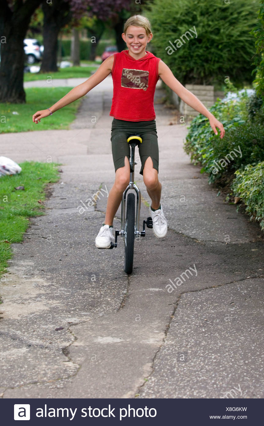Girl Riding Unicycle High Resolution Stock Photography and Images - Alamy