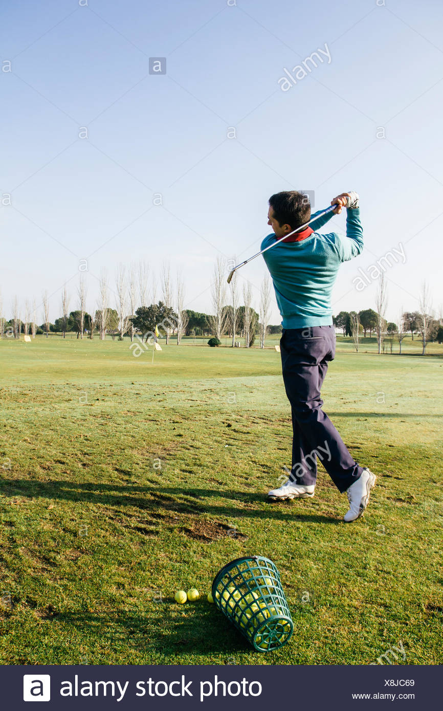 Hitting Golf Ball Stock Photos & Hitting Golf Ball Stock Images - Alamy