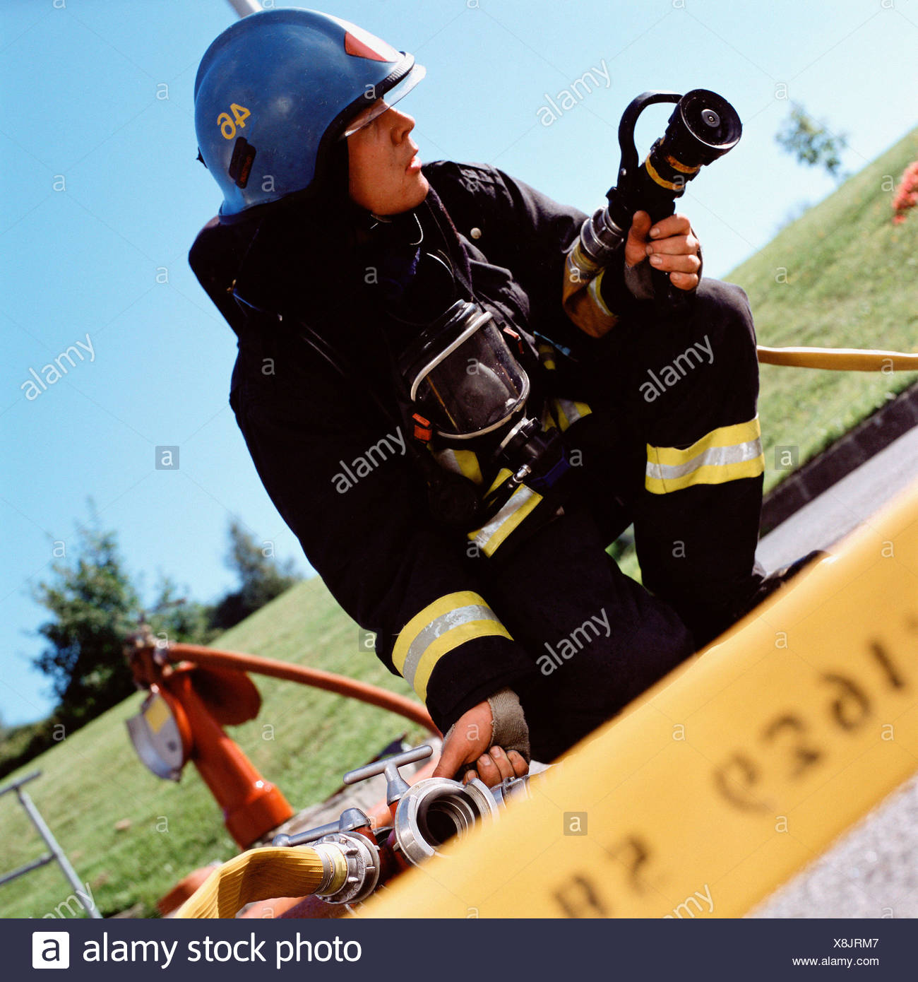 Fireman Hose Person Stock Photos & Fireman Hose Person Stock Images - Alamy