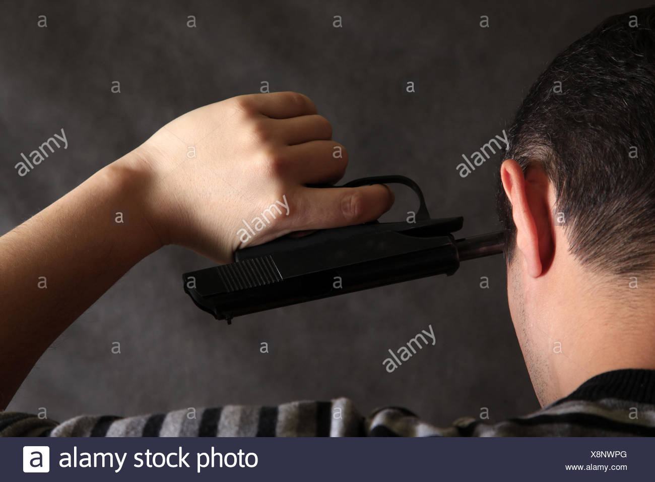 Young Handsome Man Holding Hand Gun High Resolution Stock Photography ...