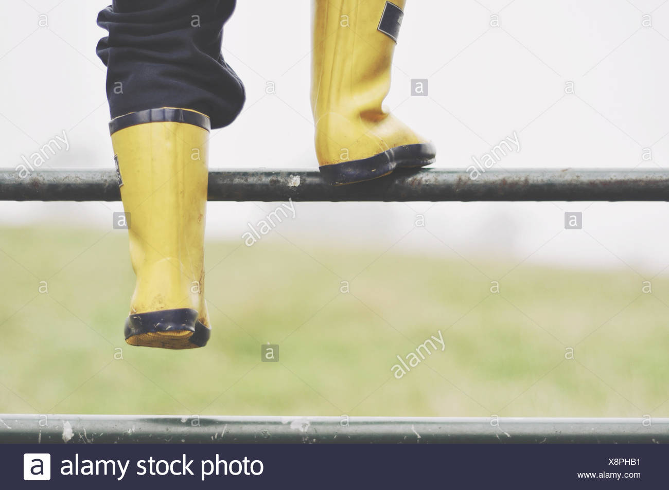 Climbing The Fence Stock Photos & Climbing The Fence Stock Images - Alamy