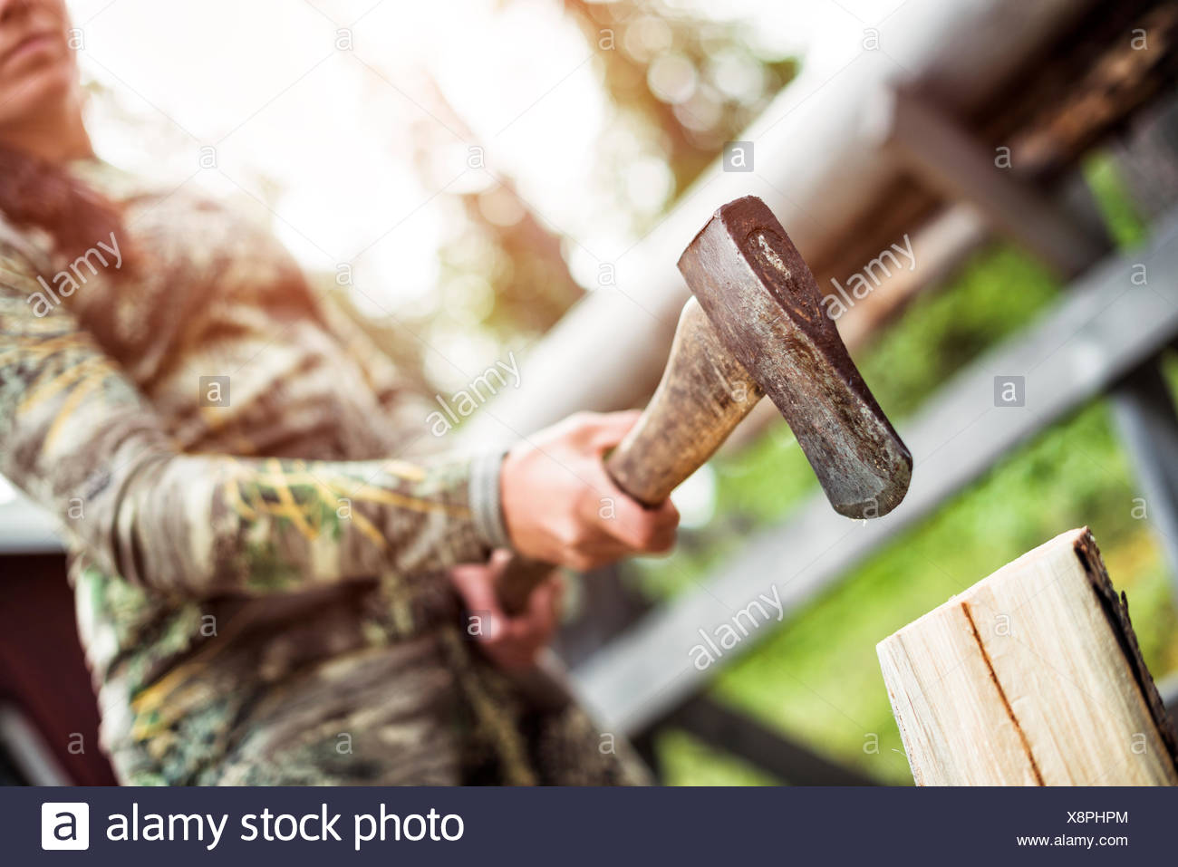Woman Chopping Wood Outdoors High Resolution Stock Photography and ...