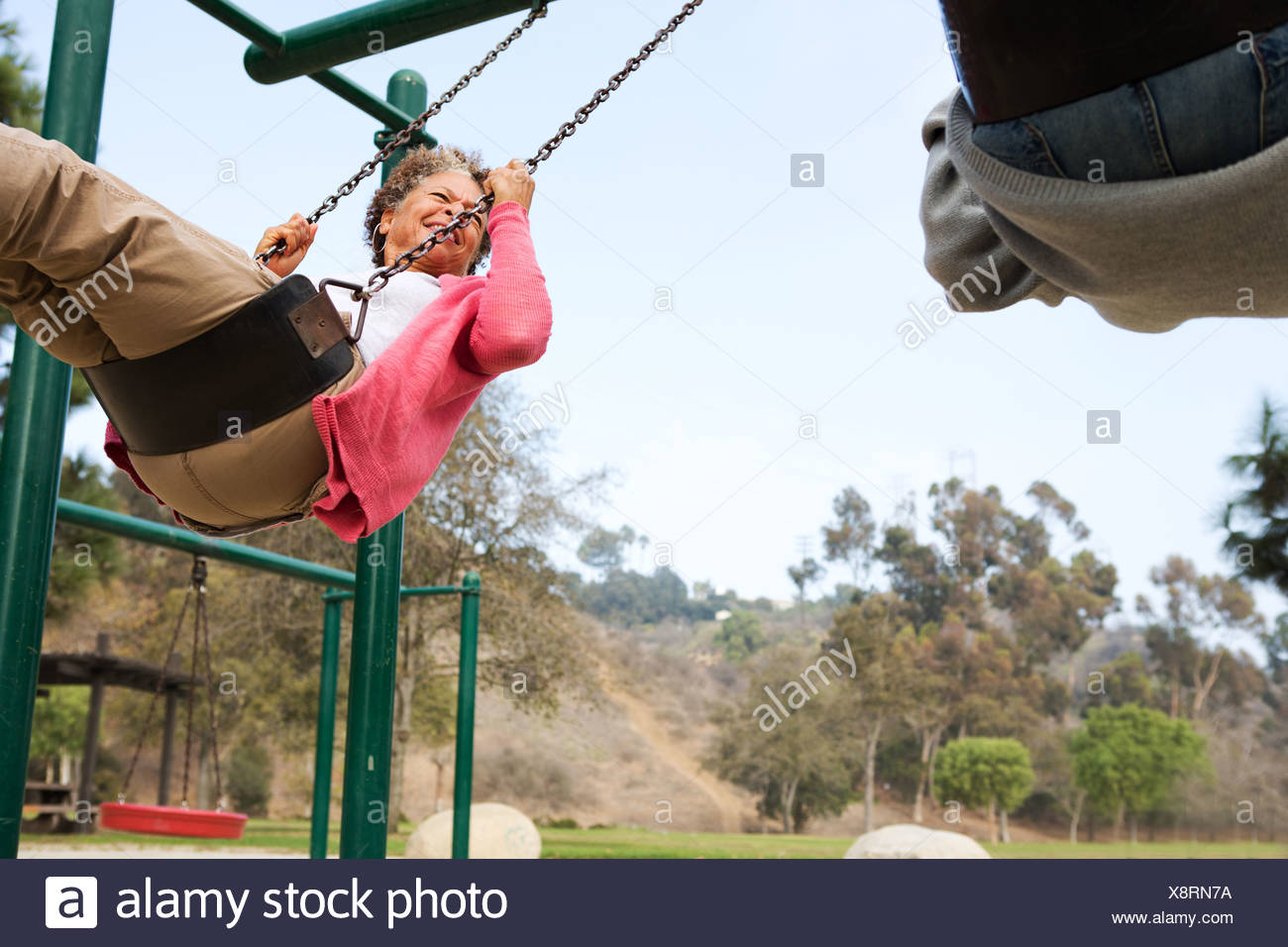 Swings In Park High Resolution Stock Photography and Images - Alamy