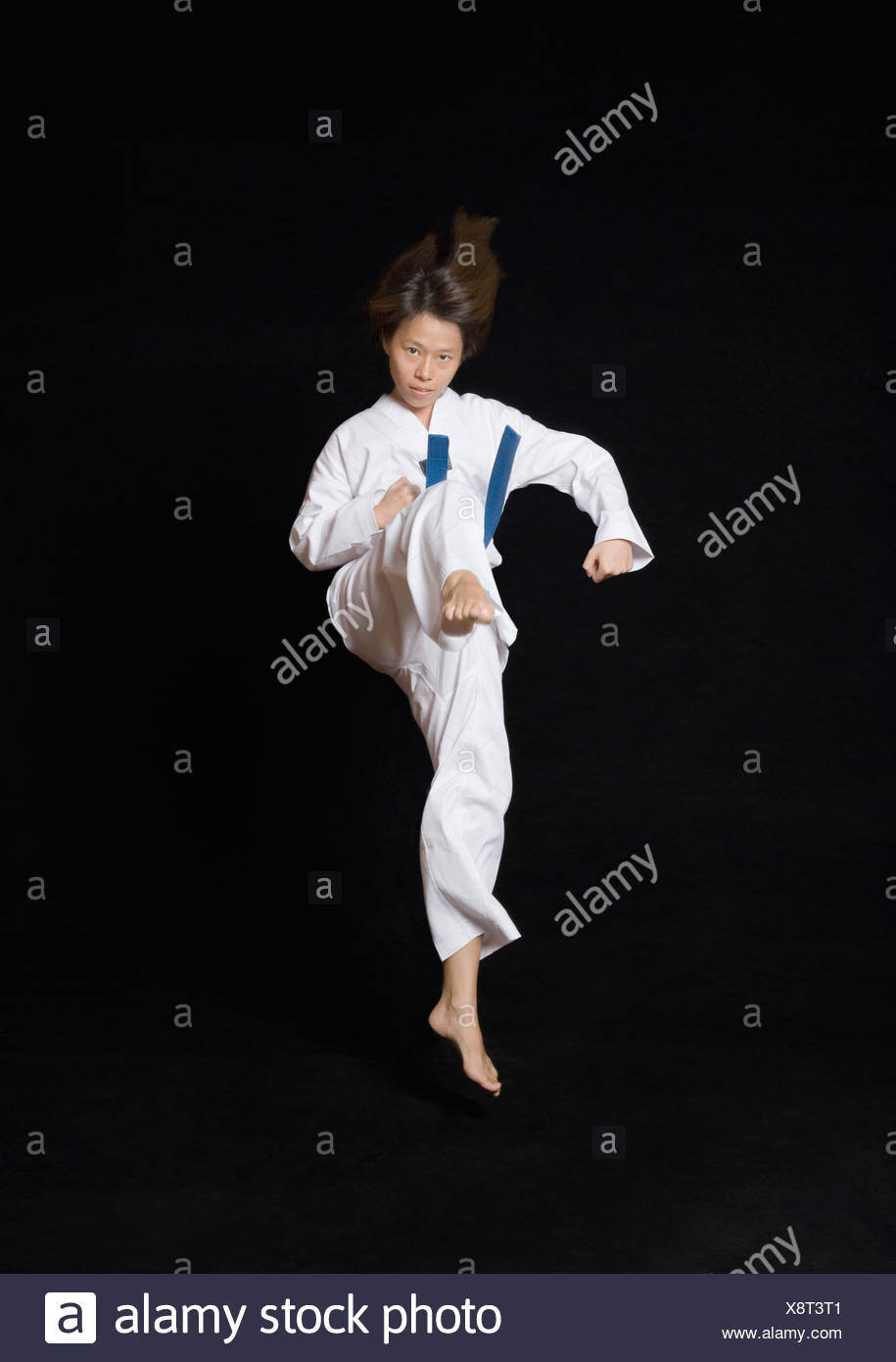 Woman Flying Kick High Resolution Stock Photography and Images - Alamy