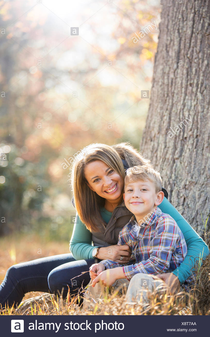 Boy Hugging Tree High Resolution Stock Photography and Images - Alamy