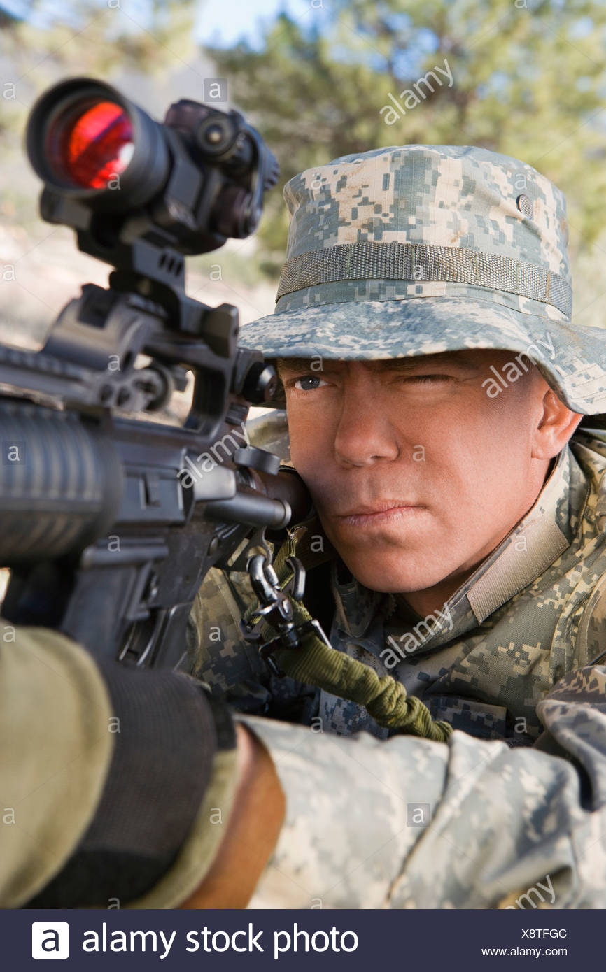 Soldier Aiming His Gun Stock Photos & Soldier Aiming His Gun Stock ...