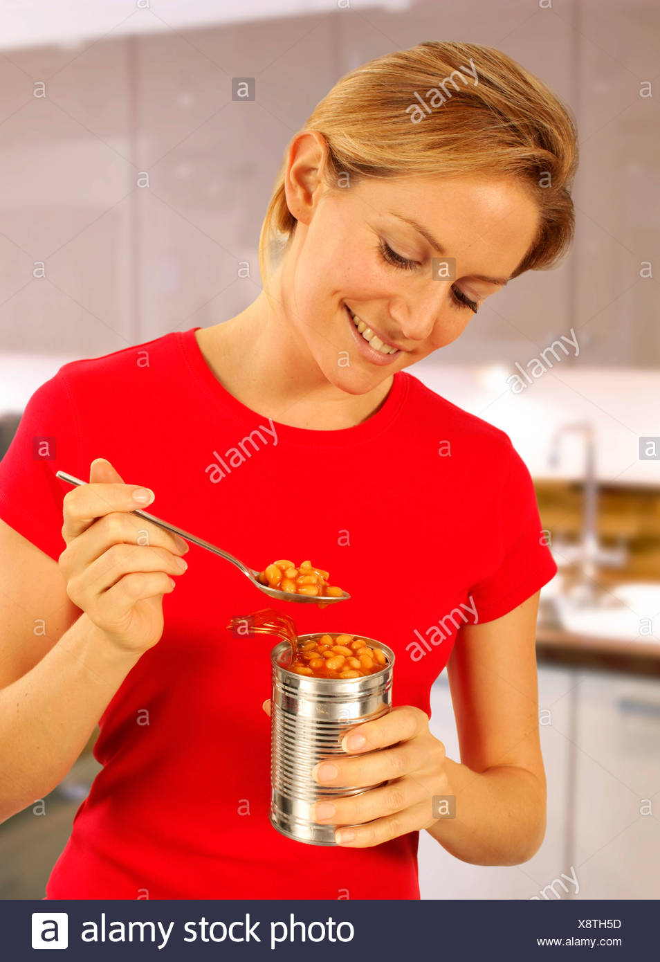 Girl Eating Baked Beans High Resolution Stock Photography and Images ...