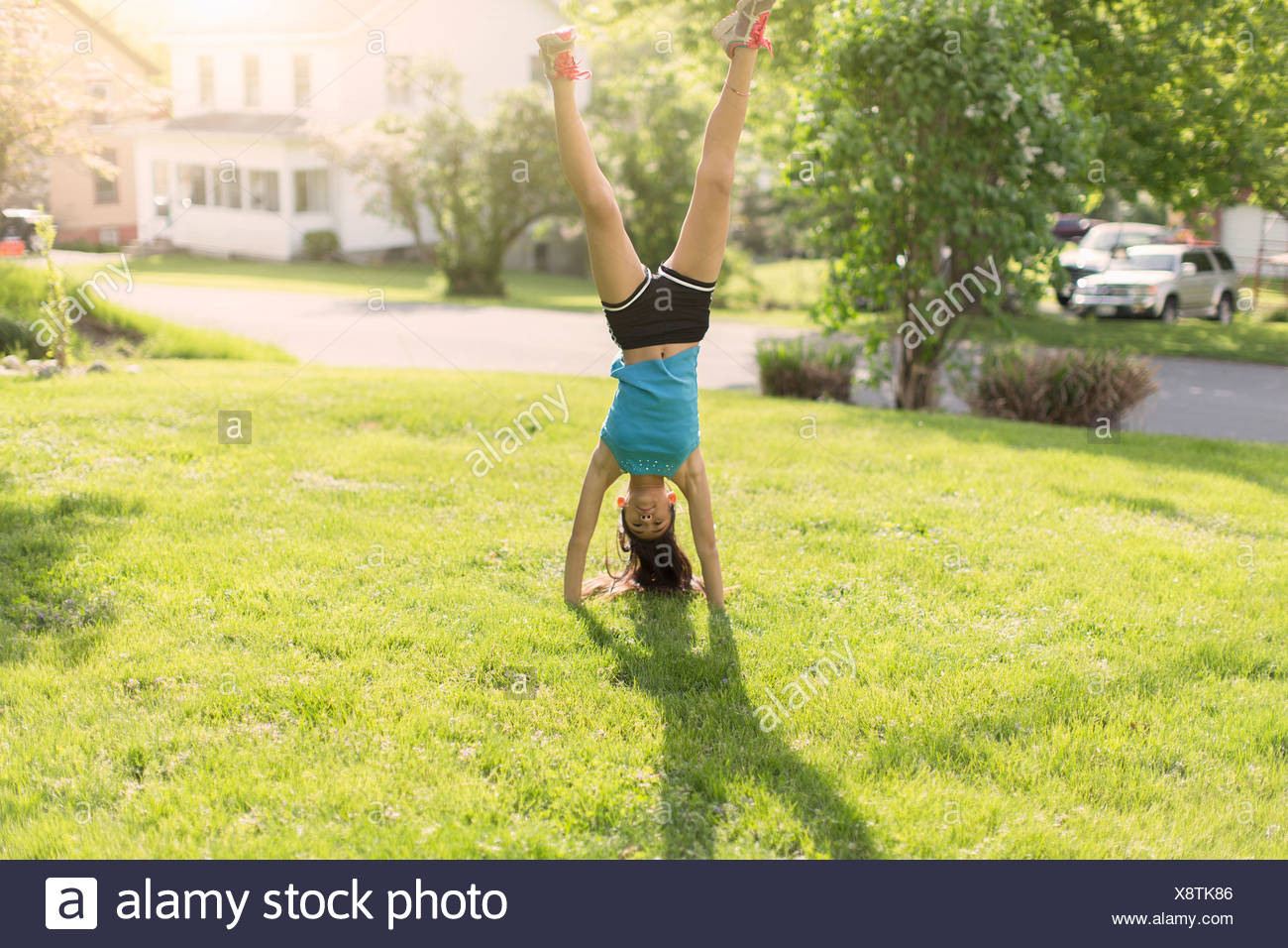 Girl Doing Handstand High Resolution Stock Photography and Images - Alamy